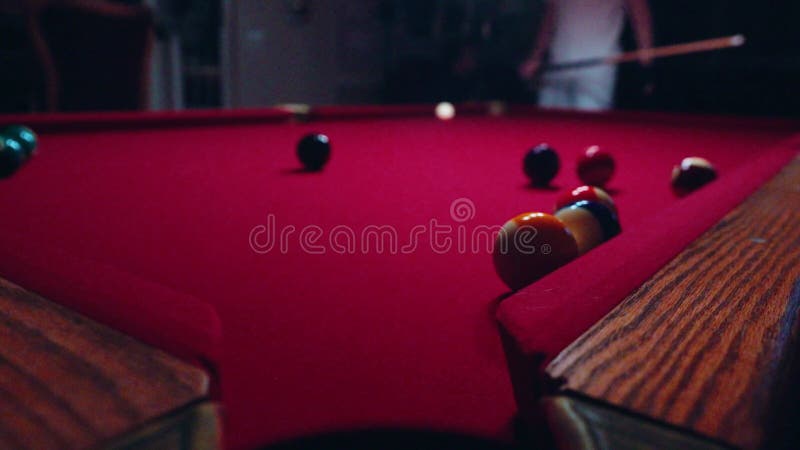 Billiard Game in Motion, Balls Scattered on a Red Pool Table with a ...