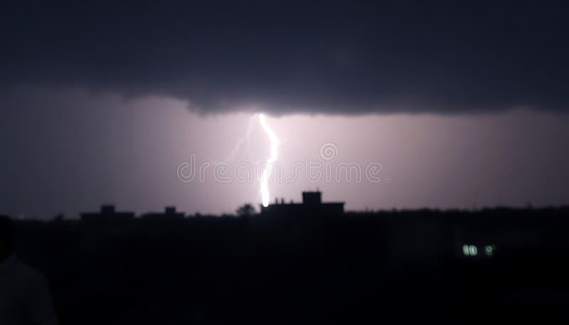 Lightning is Seen Over a City at Night Stock Illustration ...