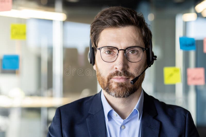 Professional Man with Headset in a Modern Office Setting Stock Photo ...