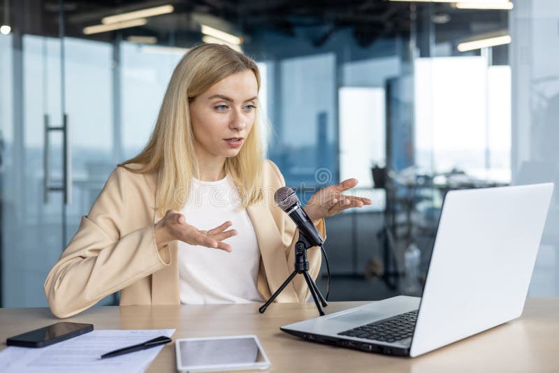 Professional Woman Delivering a Presentation in Modern Office Stock ...