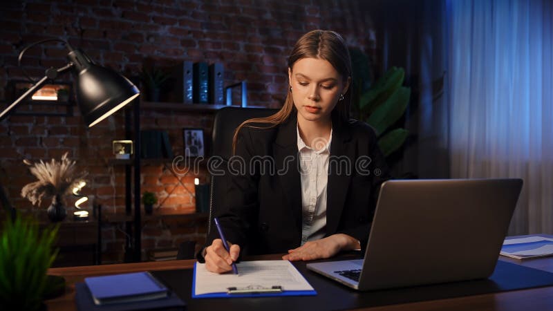Focused Professional Writing Notes in Modern Office Stock Image - Image ...