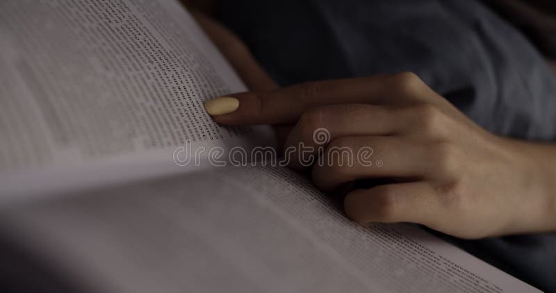 Focused Reading a Hand Holding Pages of a Book, Engaging, Learning, and ...