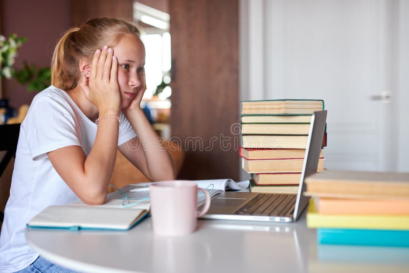 Focused School Girl Preparing Project on Notebook at Home Stock Photo ...