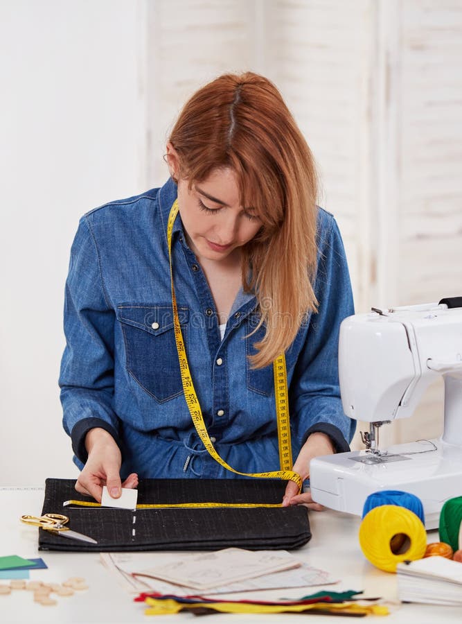 Focused Seamstress Woman Measuring Stock Photo - Image of item, hand ...