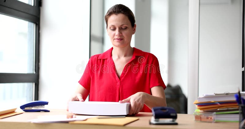 Focused Secretary Puts Thick Stack of Blank Papers on Table Stock Video ...