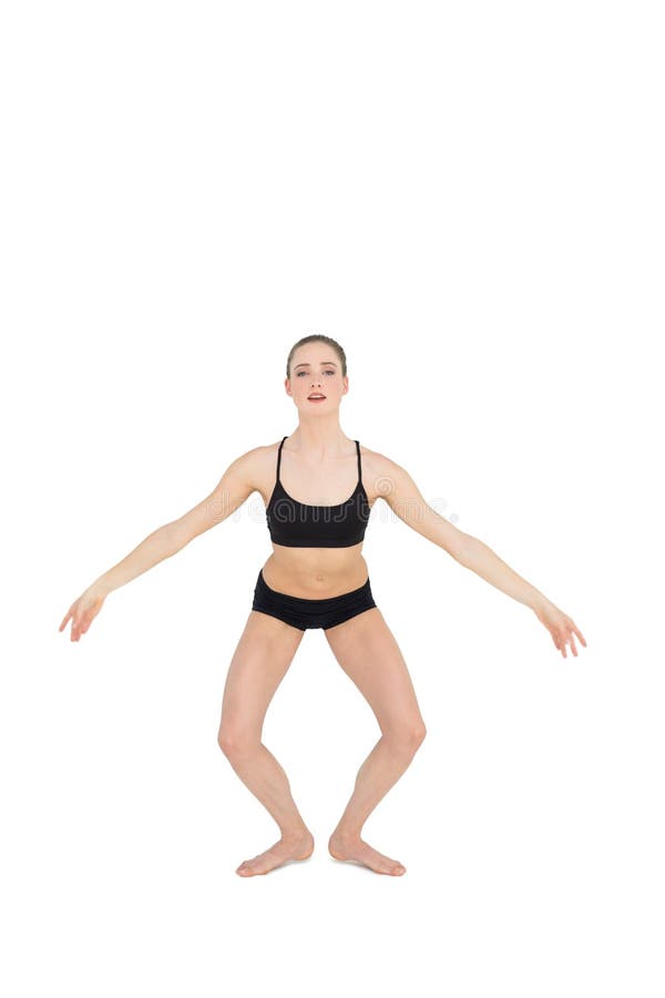 Slim Ballet Dancer Standing on the Tiptoe in the Studio Stock Photo ...