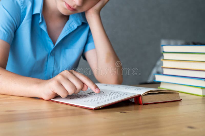 Student Studying Hard with Books on Desk. World Dyslexia Awareness Day ...