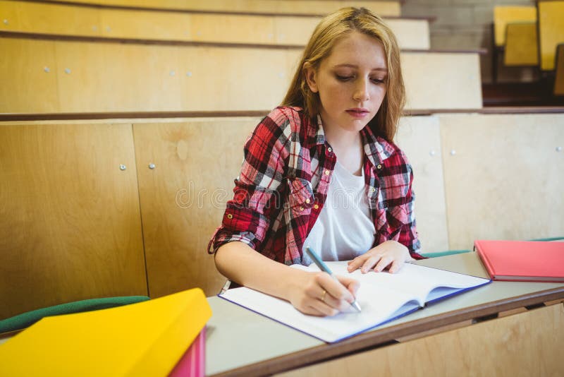 Focused Student Taking Notes during Class Stock Image - Image of ...