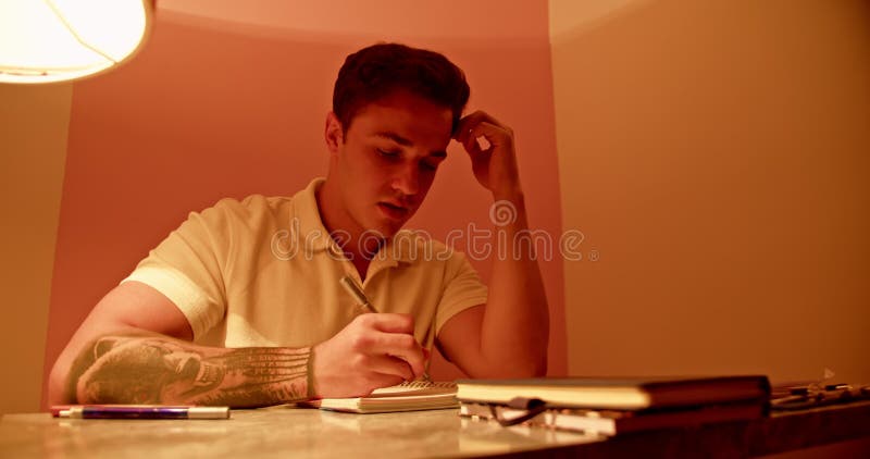 Focused Student Working Late at Night on a Project, Preparing for Exams ...