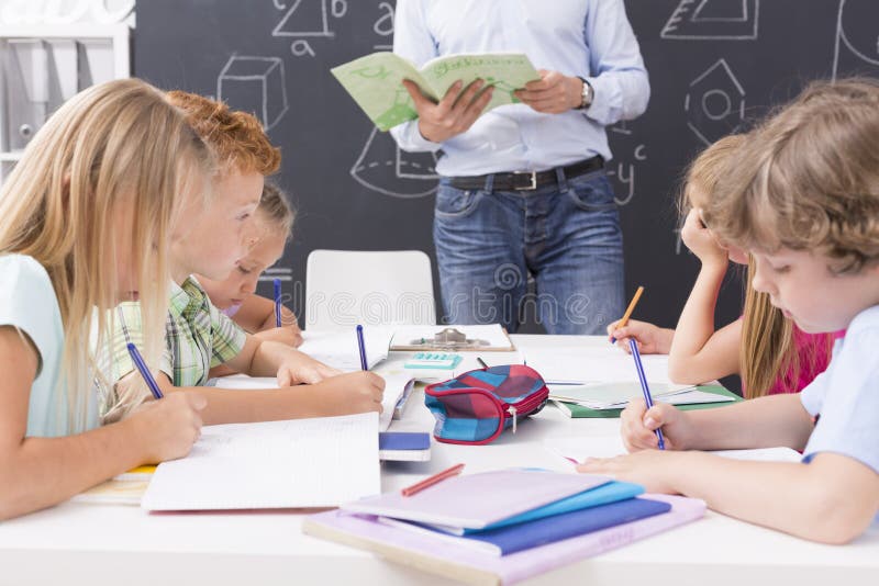 Focused on the task stock image. Image of children, teaching - 78076633