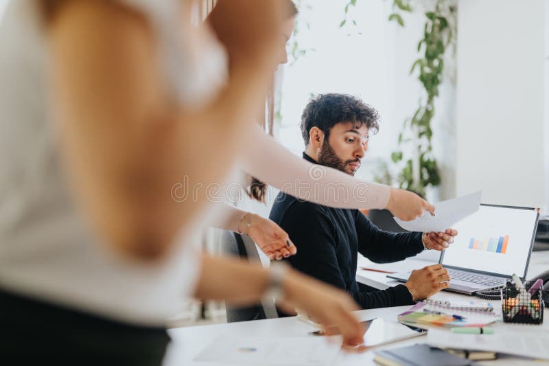 Focused Professional Analyzing Documents in a Collaborative Office ...