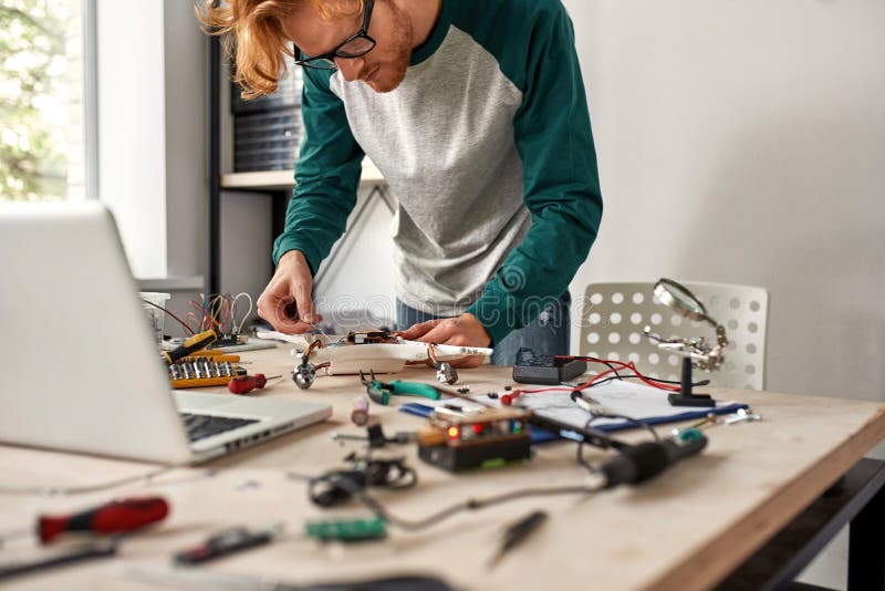 Focused it Technician Looking at Broken Quadcopter Stock Image - Image ...