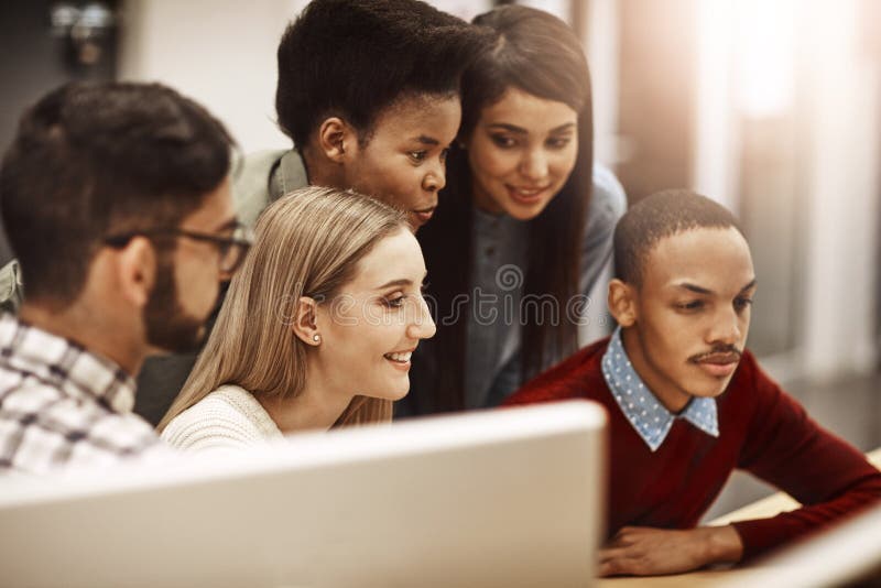Focused on Their Group Assignment. a Group of University Students ...