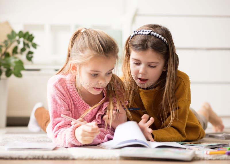 Focused on their studies stock image. Image of females - 173011003