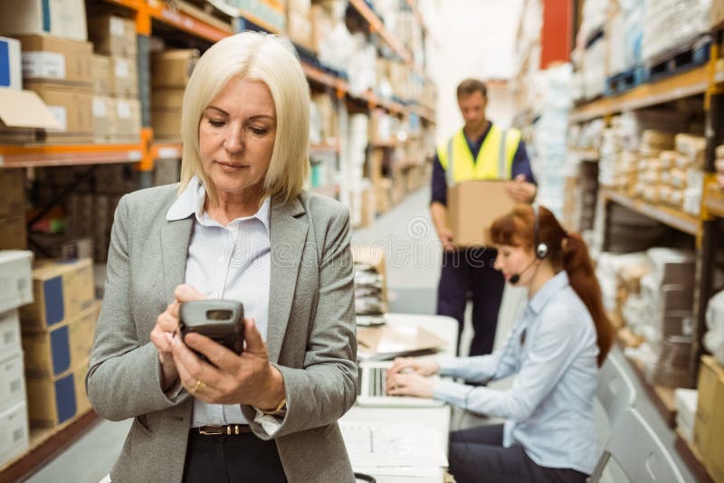 Focused Warehouse Manager Using Handheld Stock Image - Image of male ...