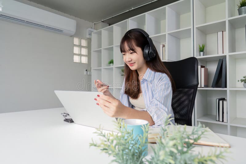 Focused Woman Engaging in Online Study Session at Home Stock Photo - Image of learning ...