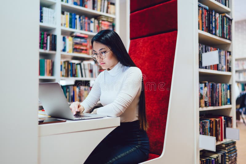 Focused Woman Learning on Laptop in Study Space Stock Photo - Image of ...