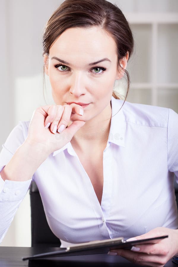 Focused Woman Looking In Front Stock Image - Image of finger, indoors ...