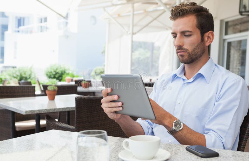 Focused Young Businessman Working on Tablet Stock Image - Image of male ...