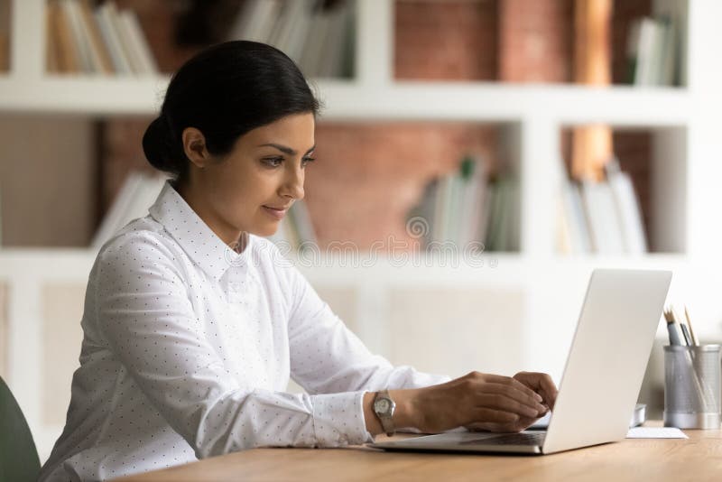 Focused Young Indian Ethnicity Business Lady Working on Computer. Stock ...