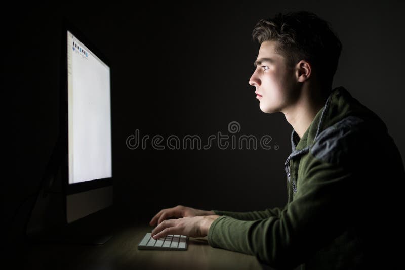 864 Man Sitting Table Using Computer Dark Room Stock Photos - Free ...