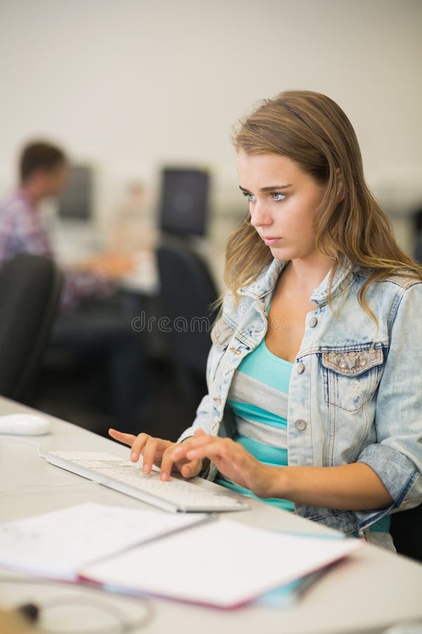 Focused Young Student Studying in the Computer Room Stock Image - Image ...