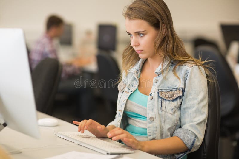 Focused Young Student Working in the Computer Room Stock Photo - Image ...