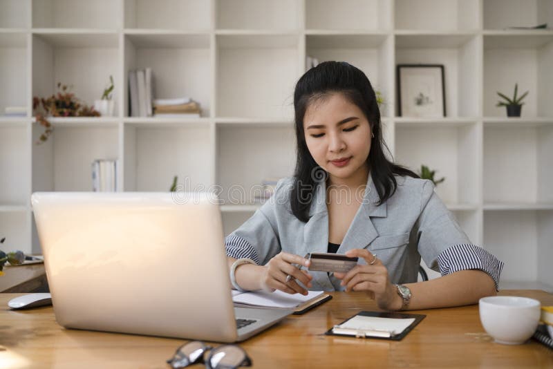 Focused Woman Making Banking Online or Payment Online with Laptop ...