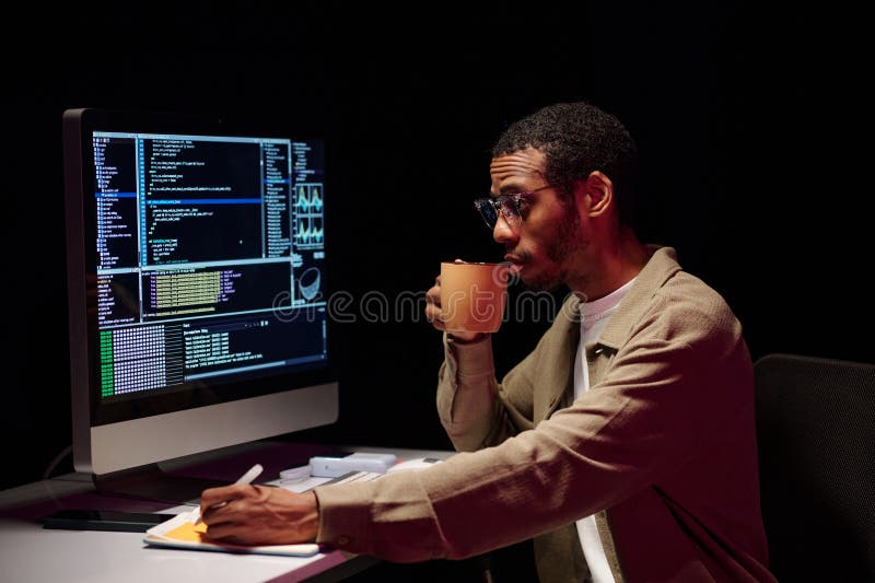 Focusing on Coding with Coffee at Desk Stock Image - Image of screen ...
