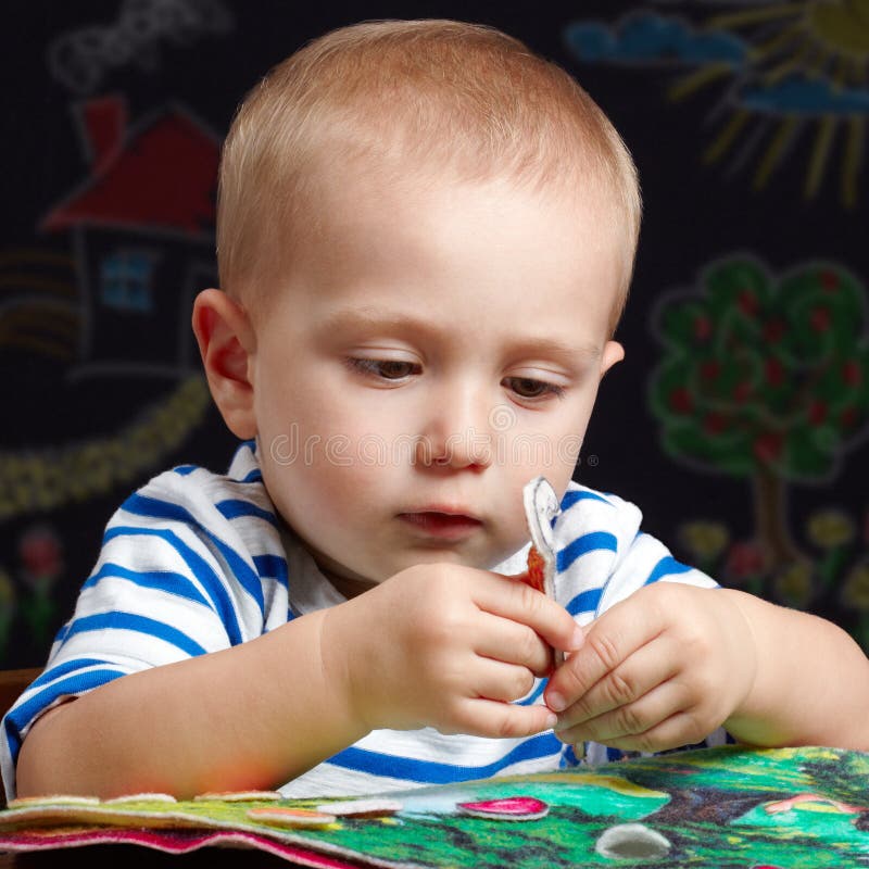 Focusing on playing stock photo. Image of felt, expression - 21434916