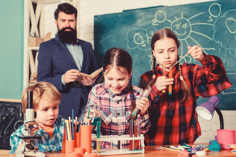 Focusing on Work. Doing Experiments with Liquids in Chemistry Lab ...