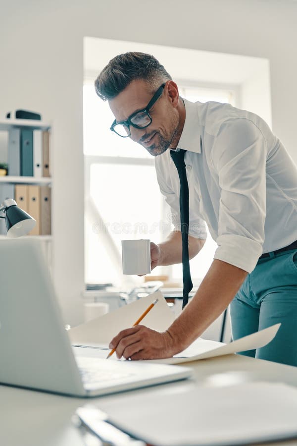 Focusing at work. stock image. Image of adult, handsome - 149881901