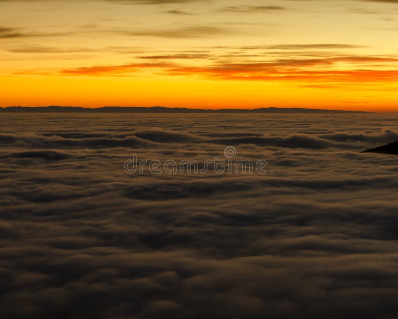 Fog Above the City in the Sunset Stock Image - Image of landscape, hill ...