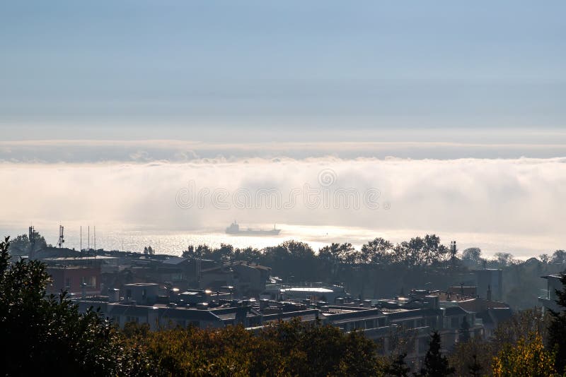 Fog Clouds Over the Sea with a Ship Stock Photo - Image of light, cloud ...