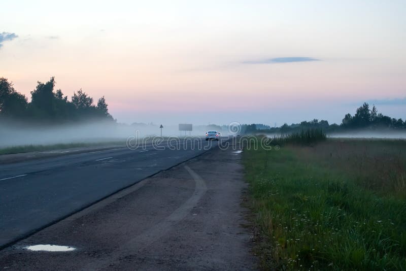 Fog on a Country Road at Sunset Stock Photo - Image of forest, trees ...