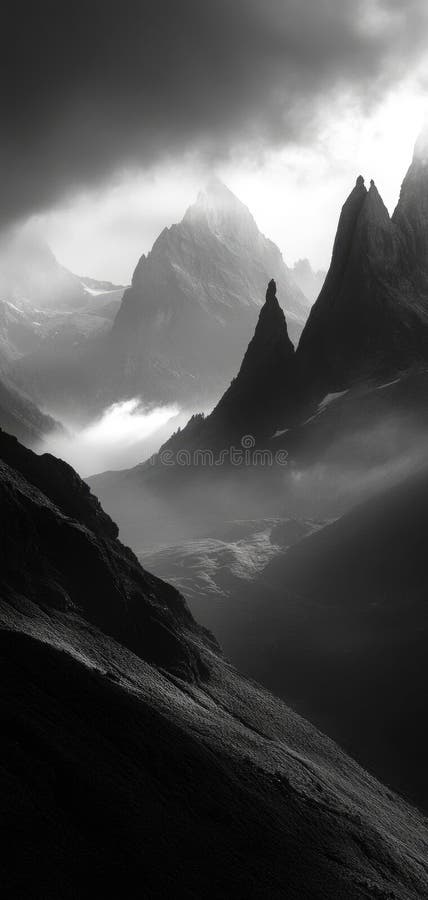 Fog-covered Valleys and Sharp Peaks in a Dramatic Black and White ...