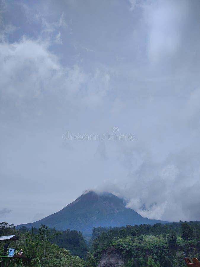 Fog covered the volcano stock image. Image of volcano - 264238533