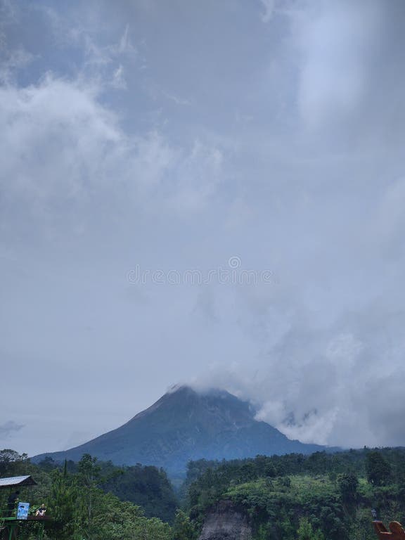 Fog covered the volcano stock image. Image of volcano - 264238533