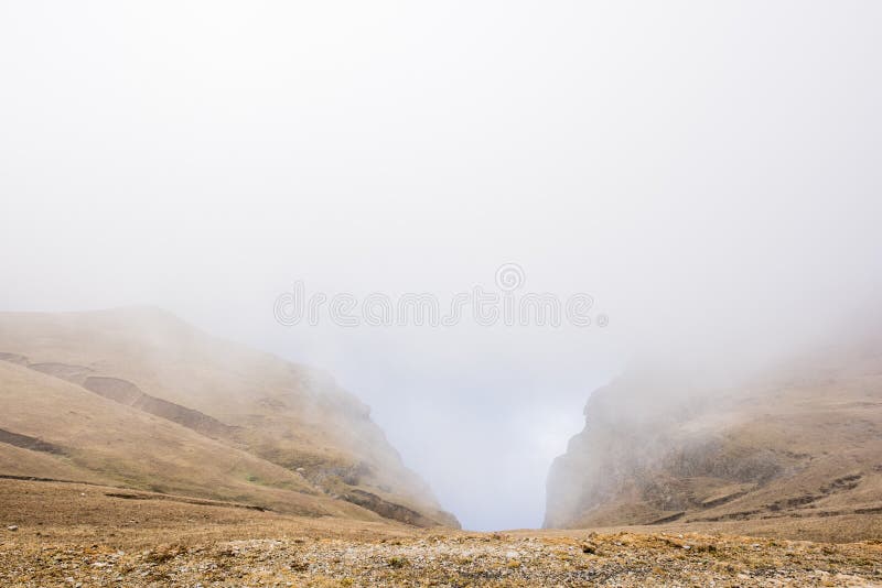 Fog Filled the Mountain Pass Stock Photo - Image of nature, winter ...