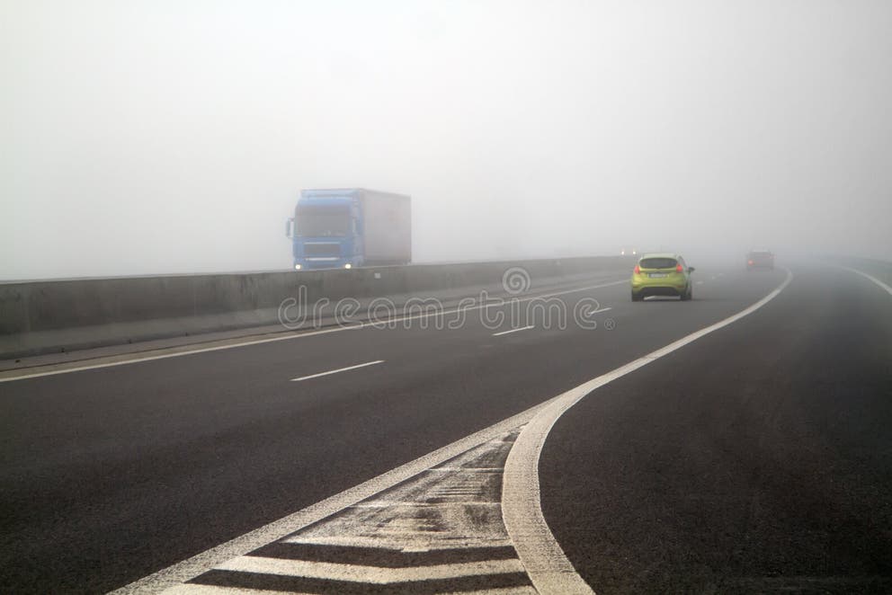 Fog on the highway stock image. Image of dense, highway - 26989519
