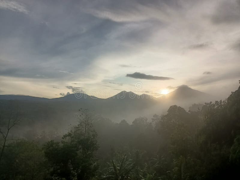 Fog in the Morning on the Shores of Mount Batukaru Stock Image - Image ...