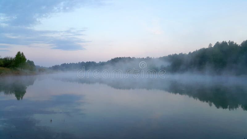 Fog over the lake stock image. Image of wild, blue, water - 103803235