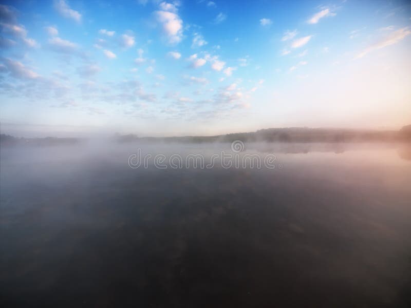 Fog over lake stock image. Image of reflection, sunrise - 30222893