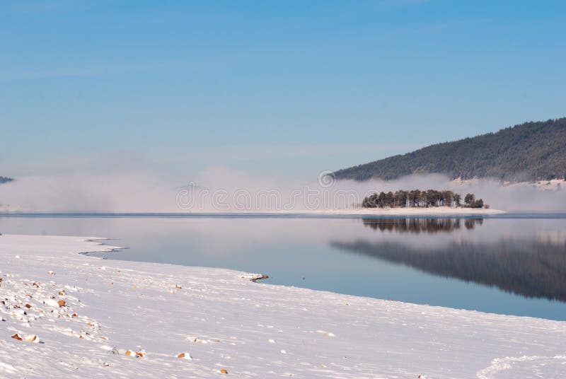 Fog over lake in winter stock image. Image of lake, winter - 28716527