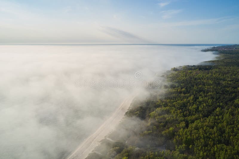Fog Over the Ocean Hitting the Shore in Denmark Stock Photo - Image of ...