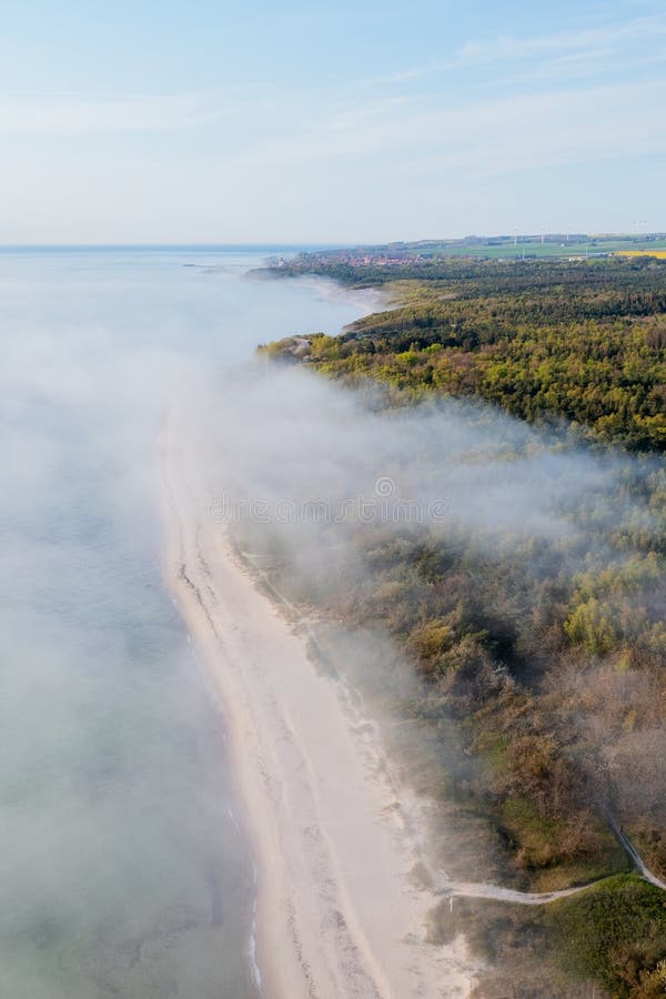 Fog Over the Ocean Hitting the Shore in Denmark Stock Photo - Image of ...