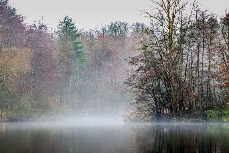 Fog Rising from a Lake in the Early Morning Stock Photo - Image of ...
