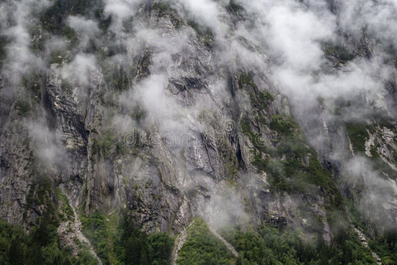Fog rising stock photo. Image of high, landscape, rock - 215451554