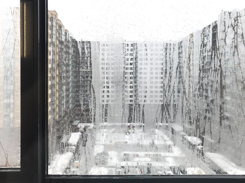 Fogged Balcony Window Overlooking the Courtyard and the Adjacent ...