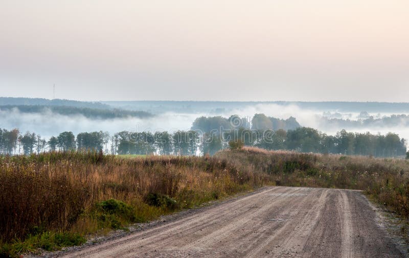 Foggy autumn sunrise stock image. Image of reflection - 84535981